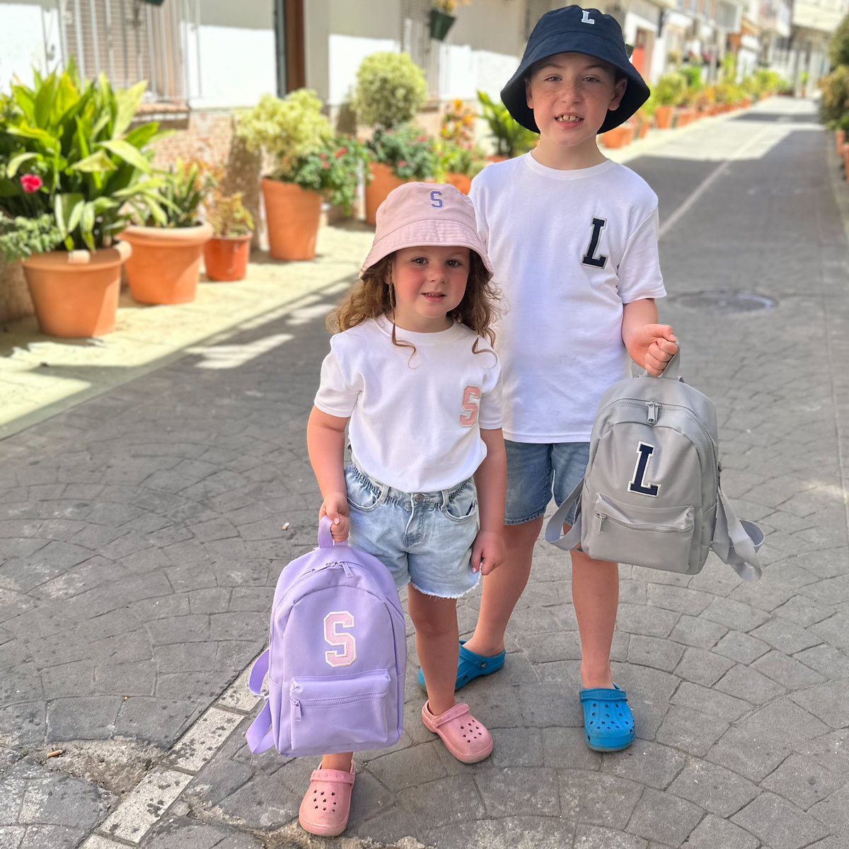 Mini Personalised Initial Varsity Backpack – Never Ever